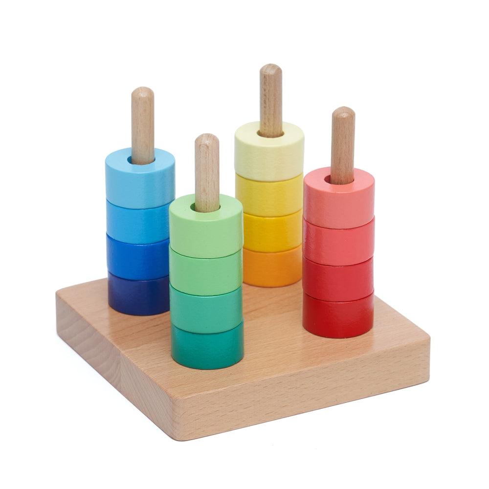 Sort And Stack Puzzle Shaded Wooden Rainbow Discs on Four Vertical Rod ...